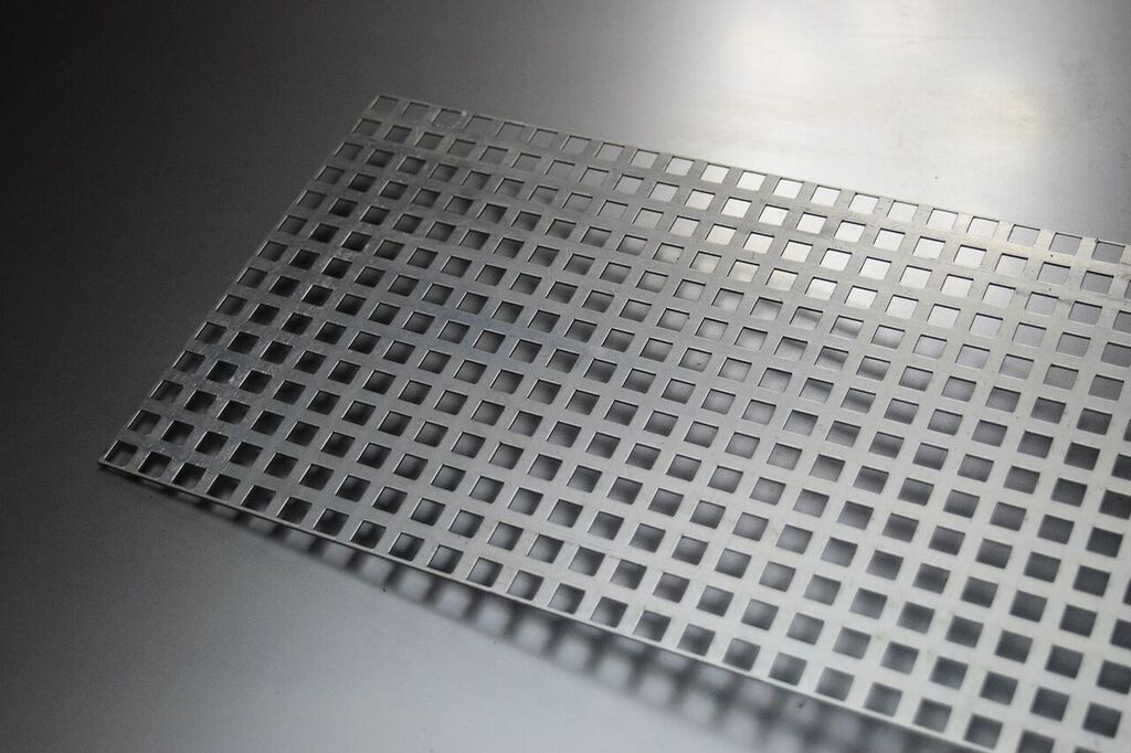 Square Hole Straight Row Pattern - Merger Metals LLC